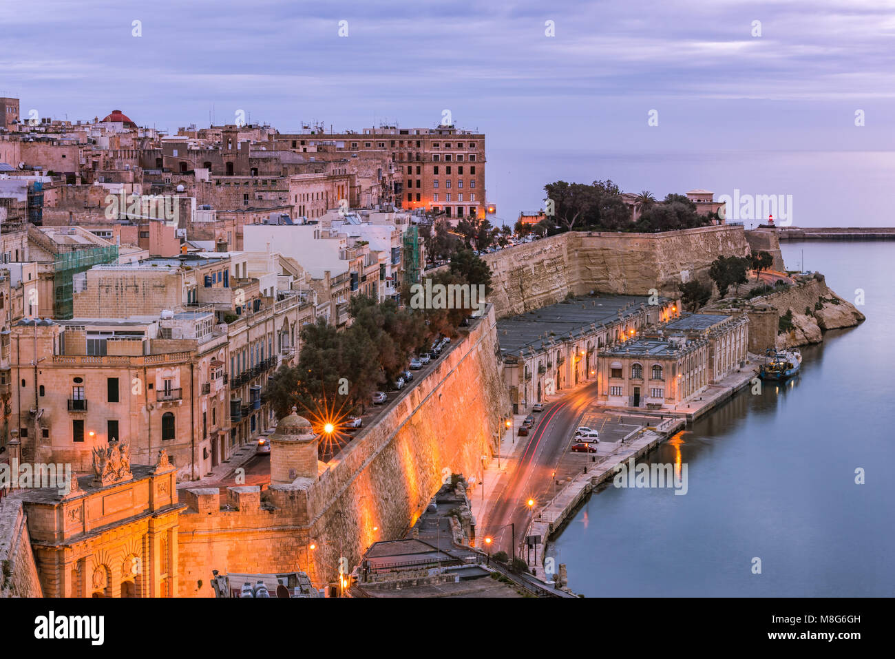 Illuminated valletta skyline evening hi-res stock photography and ...