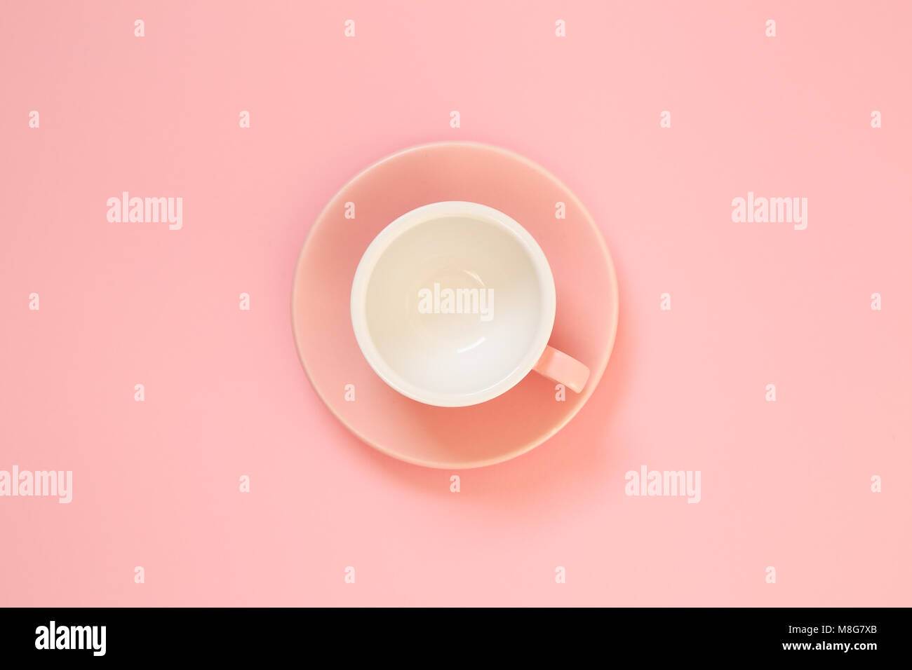 Pink coffee cup on pink background Stock Photo - Alamy