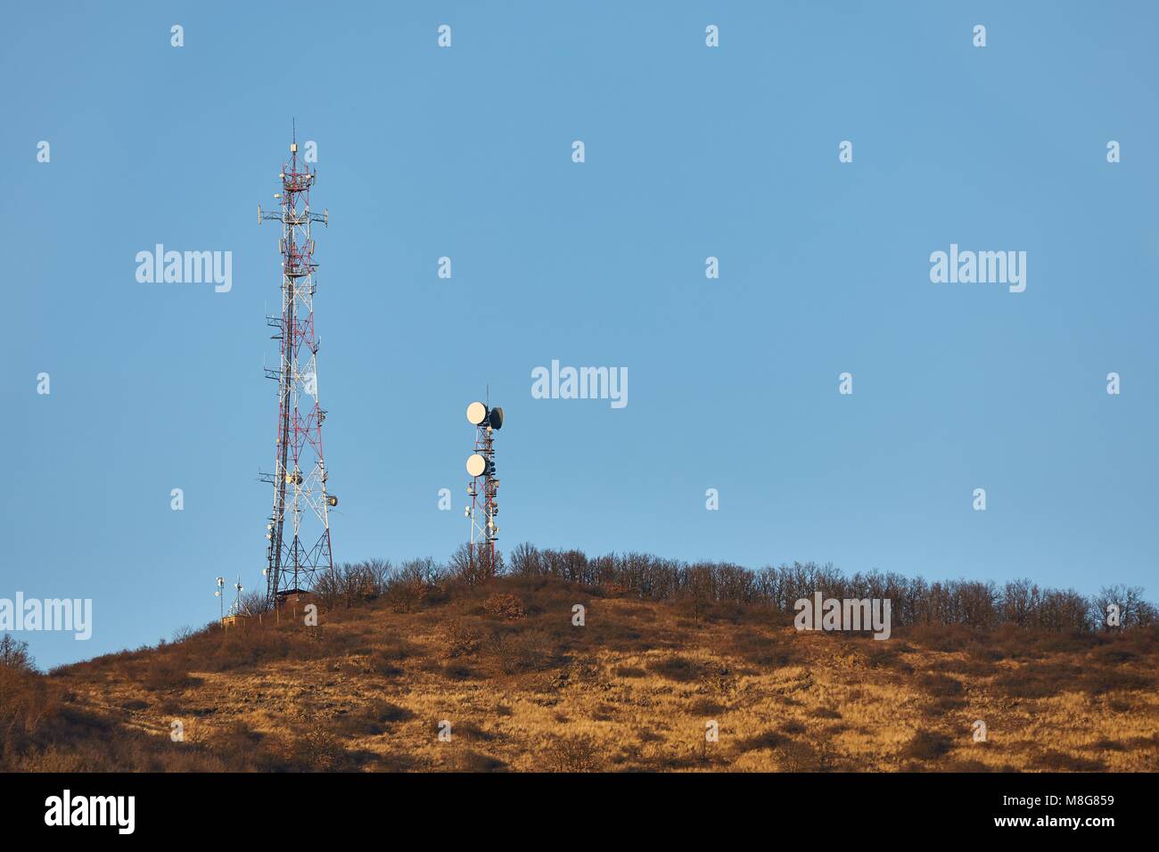 Transmitter towers on a hill Stock Photo - Alamy
