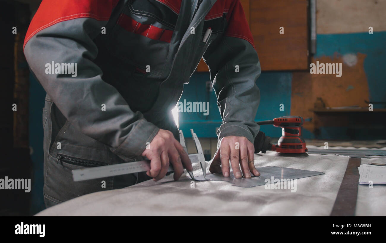 Engineer use trammel technician measuring cutting tool before cnc ...