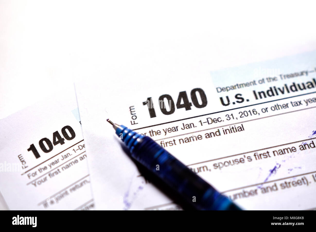 American tax form 1040 on white background. Fill-up American tax form ...