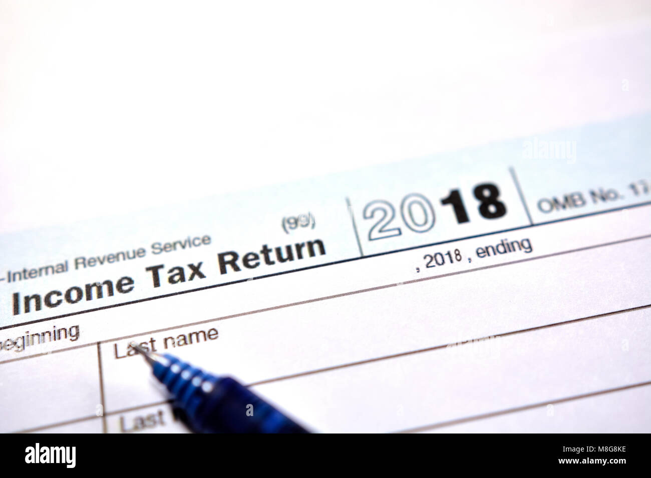 American tax form 1040 on white background. Fill-up American tax form ...