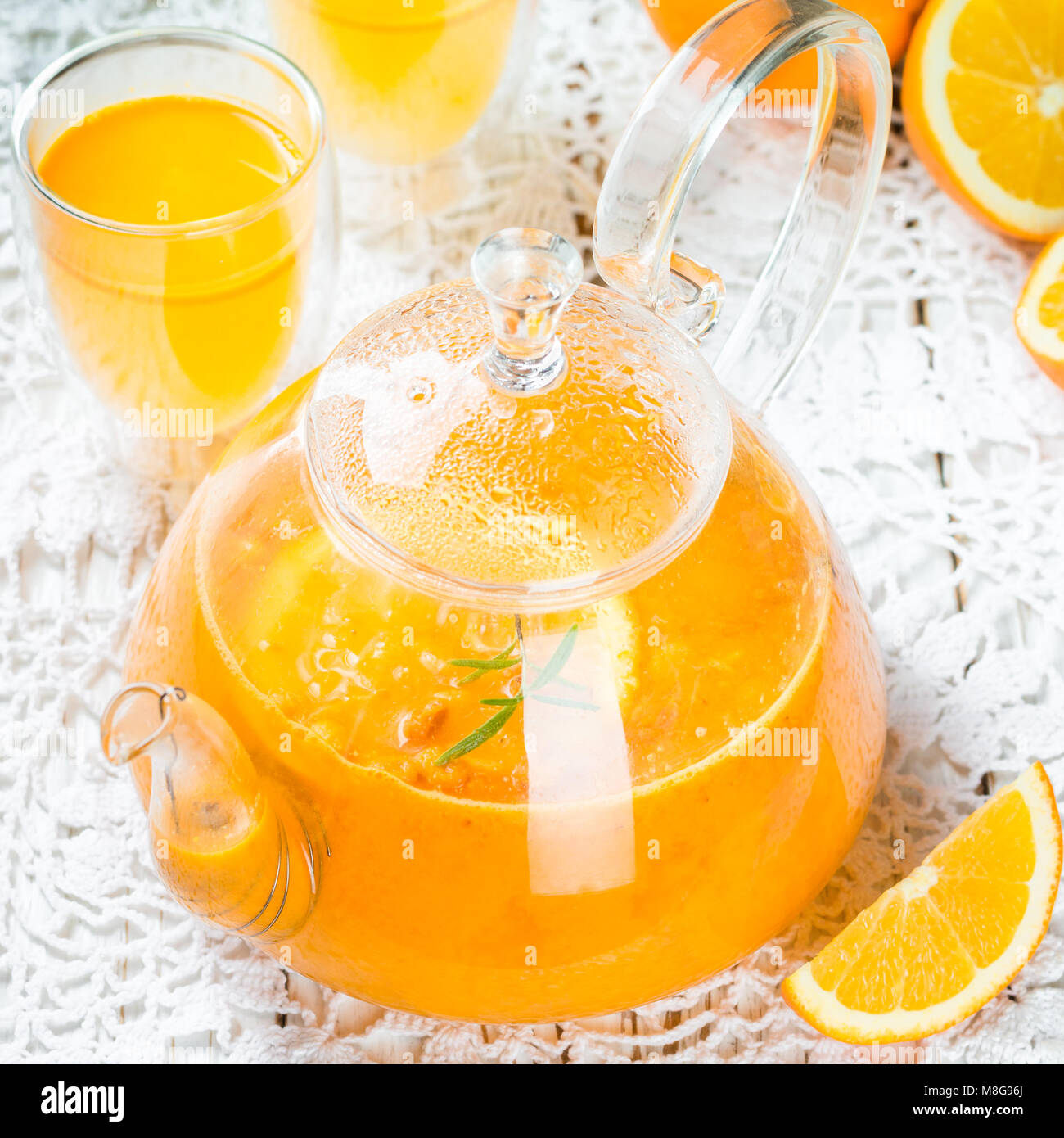 Tea made from sea buckthorn or cloudberries with orange and rosemary ...