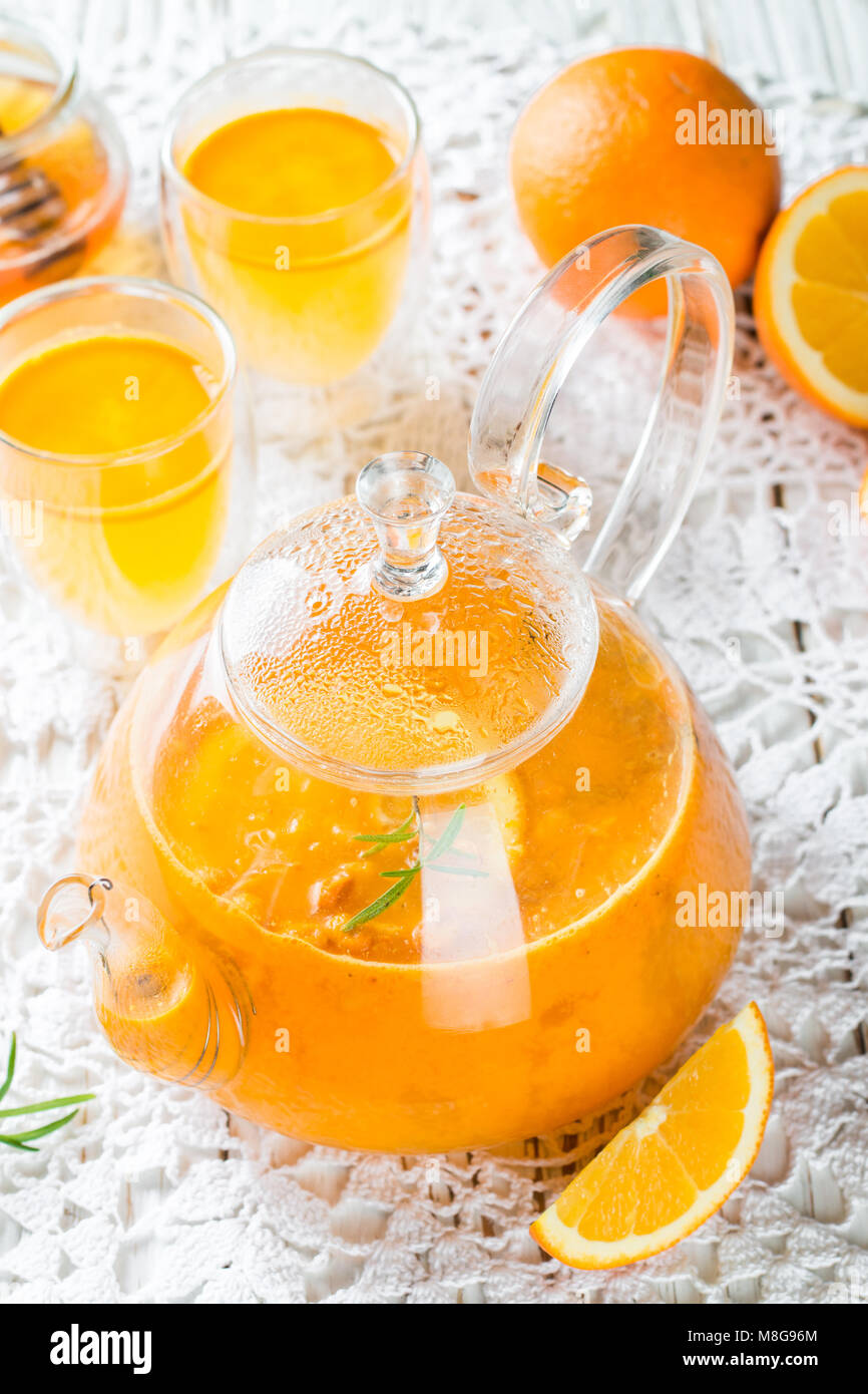 Tea made from sea buckthorn or cloudberries with orange and rosemary ...