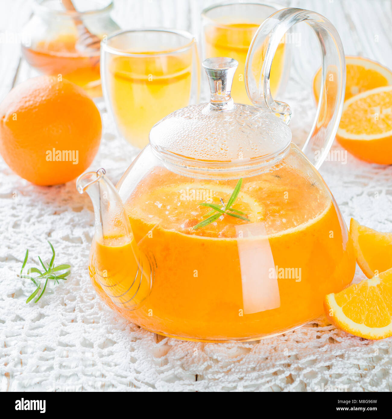 Tea made from sea buckthorn or cloudberries with orange and rosemary ...