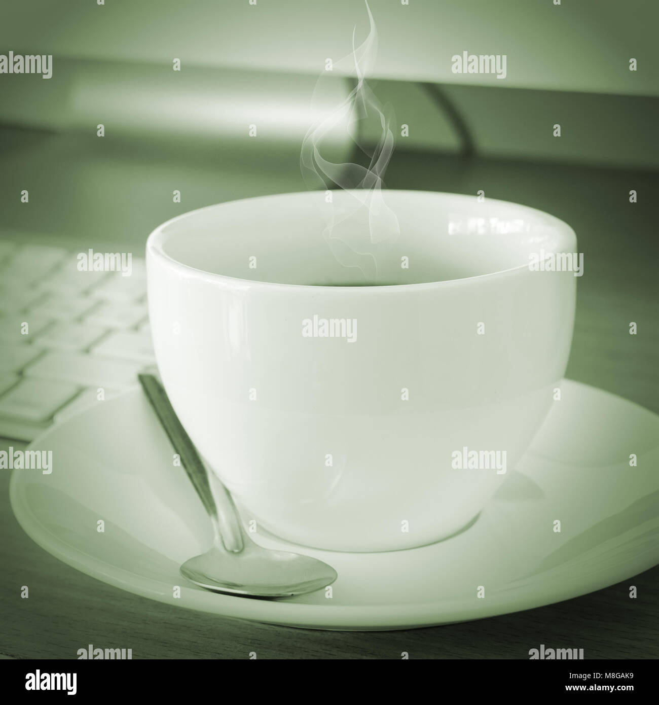 Coffee Cup on the Table with Computer Keyboard for Business Concept ...