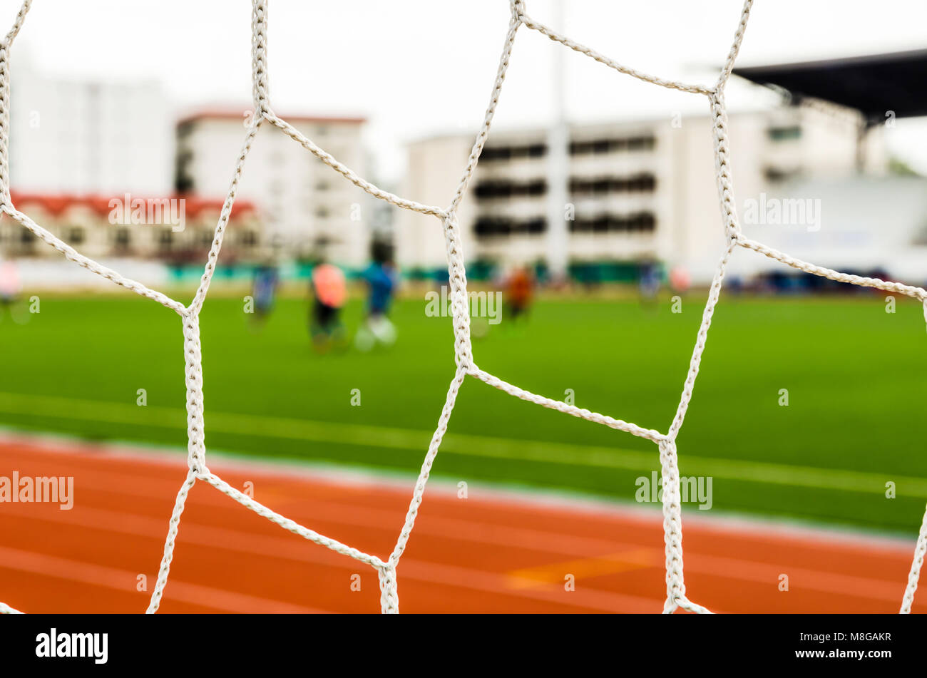 Soccer field with net texture background Stock Photo - Alamy