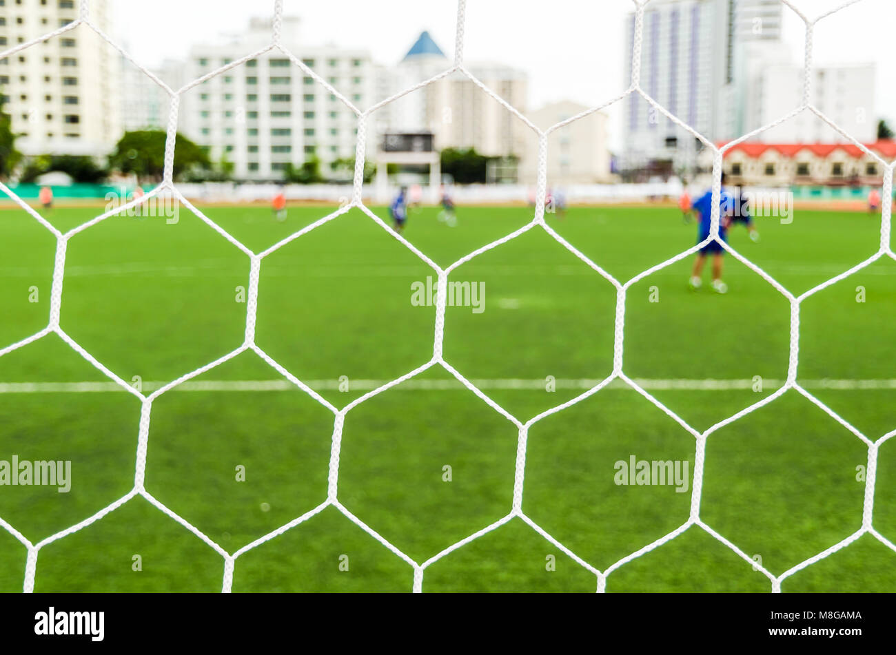 Soccer field with net texture background Stock Photo - Alamy