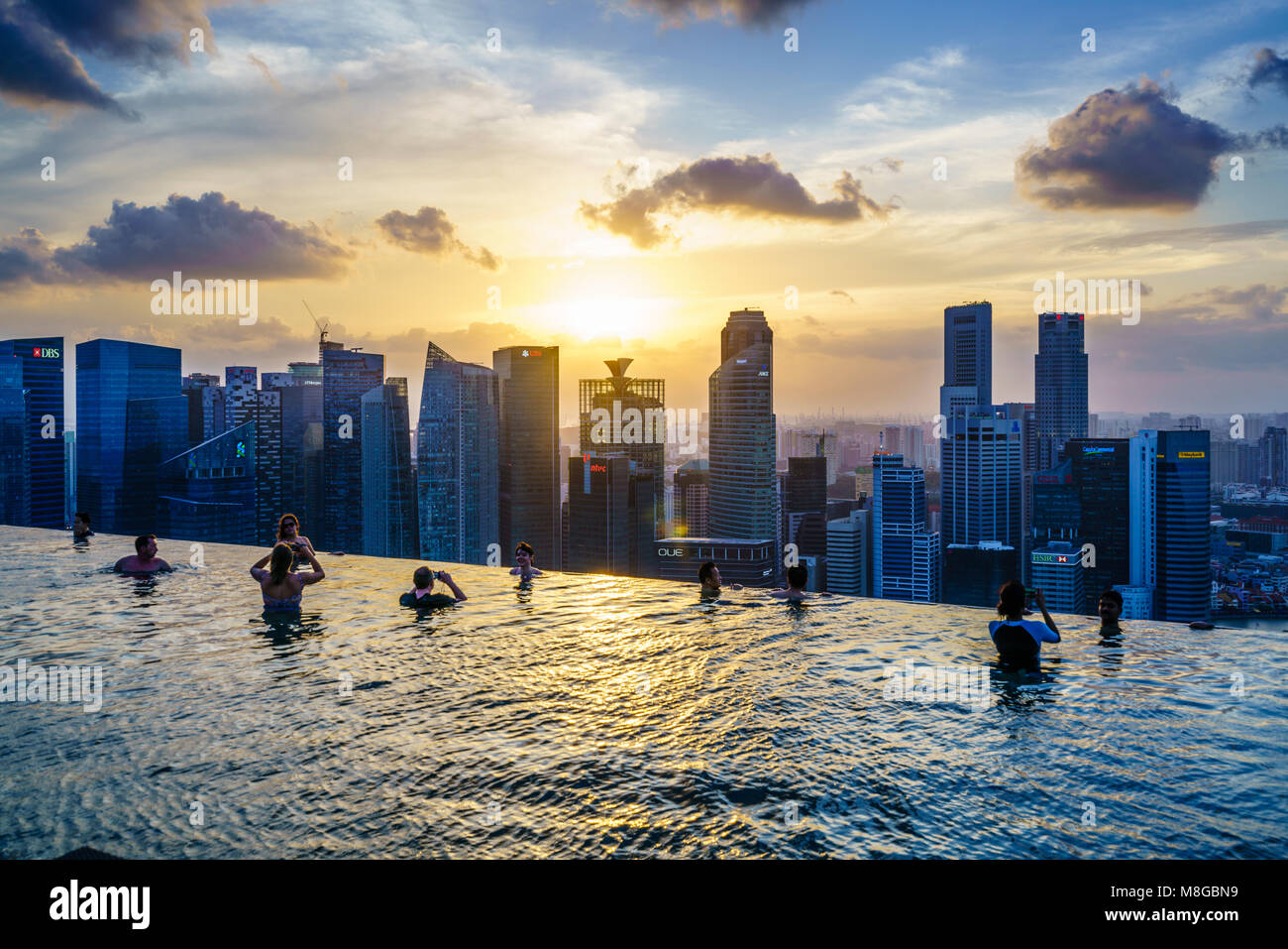 View of city skyline from Marina Bay Sands Hotel rooftop swimming pool ...
