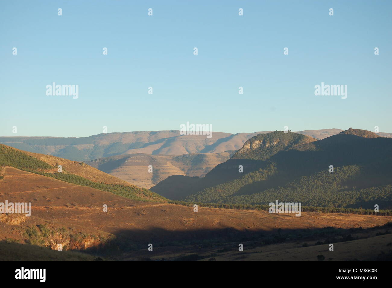 Early Morning Sunlight over Mountains Stock Photo - Alamy