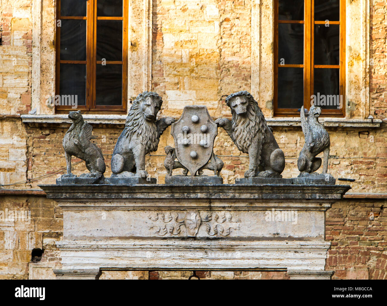 Griffin and Lion Well built at 1520 at Montepulciano, Italy Stock Photo ...