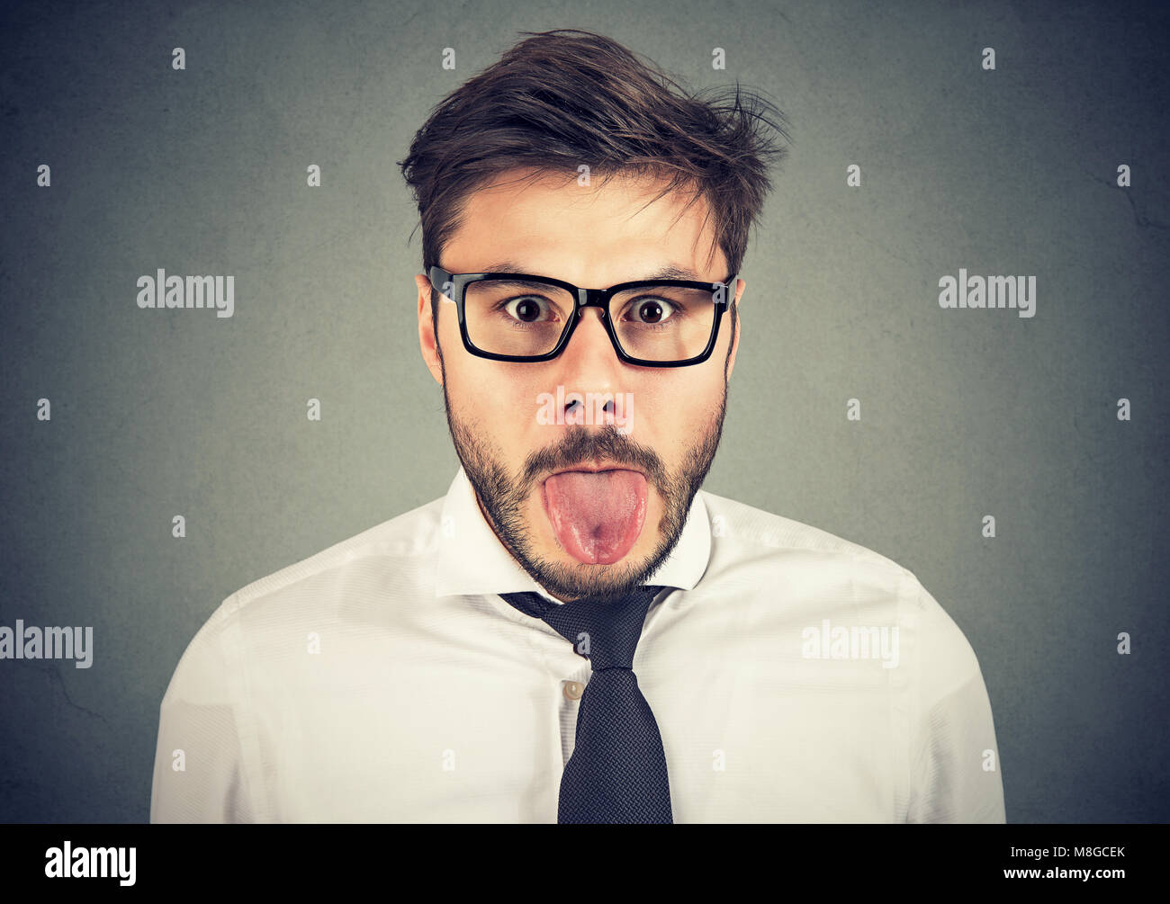 Man with tongue out hi-res stock photography and images - Alamy