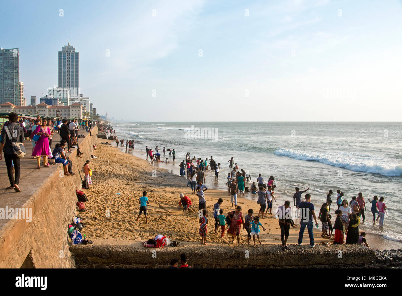 Local people on the beach by Galle Face Green - a popular spot in ...
