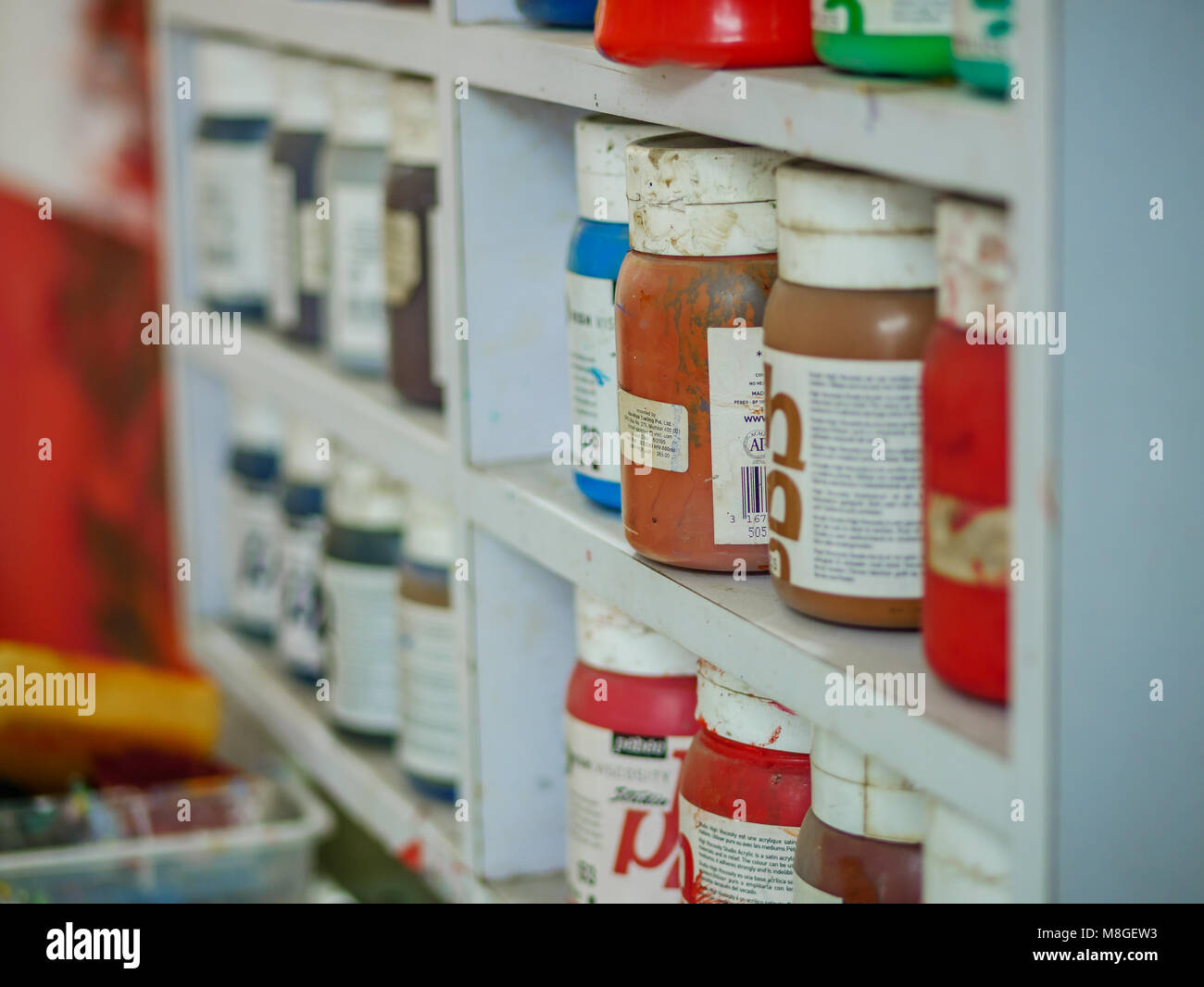 Mumbai, India – March 9, 2018: Various colourful dye in containers in ...