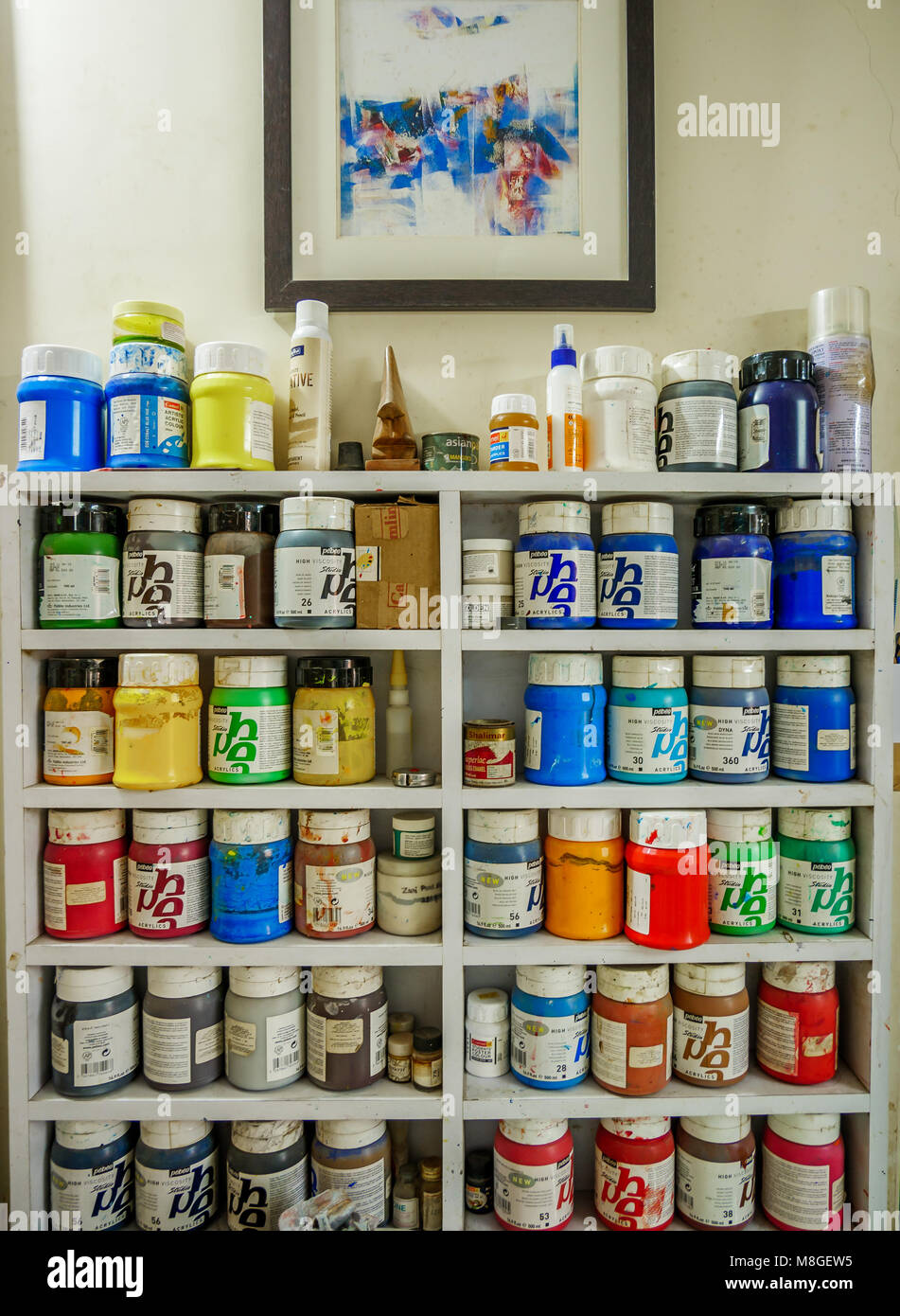 Mumbai, India – March 9, 2018: Various colourful dye in containers in ...