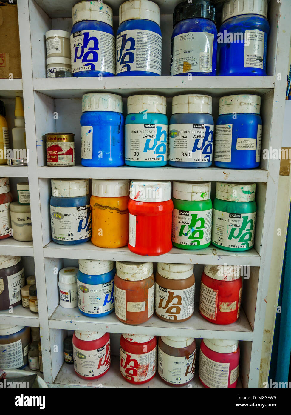 Mumbai, India – March 9, 2018: Various colourful dye in containers in ...
