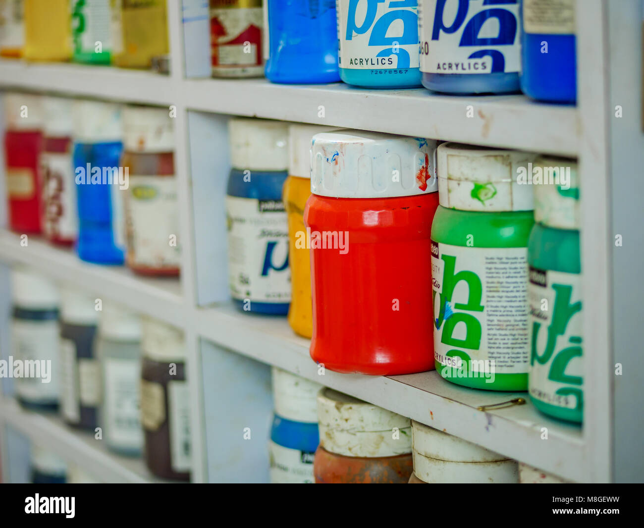 Mumbai, India – March 9, 2018: Various colourful dye in containers in ...