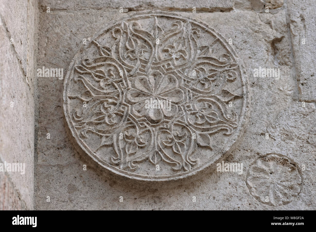 Islamic medallion motif engraved at the facade of the palace of Sitt ...