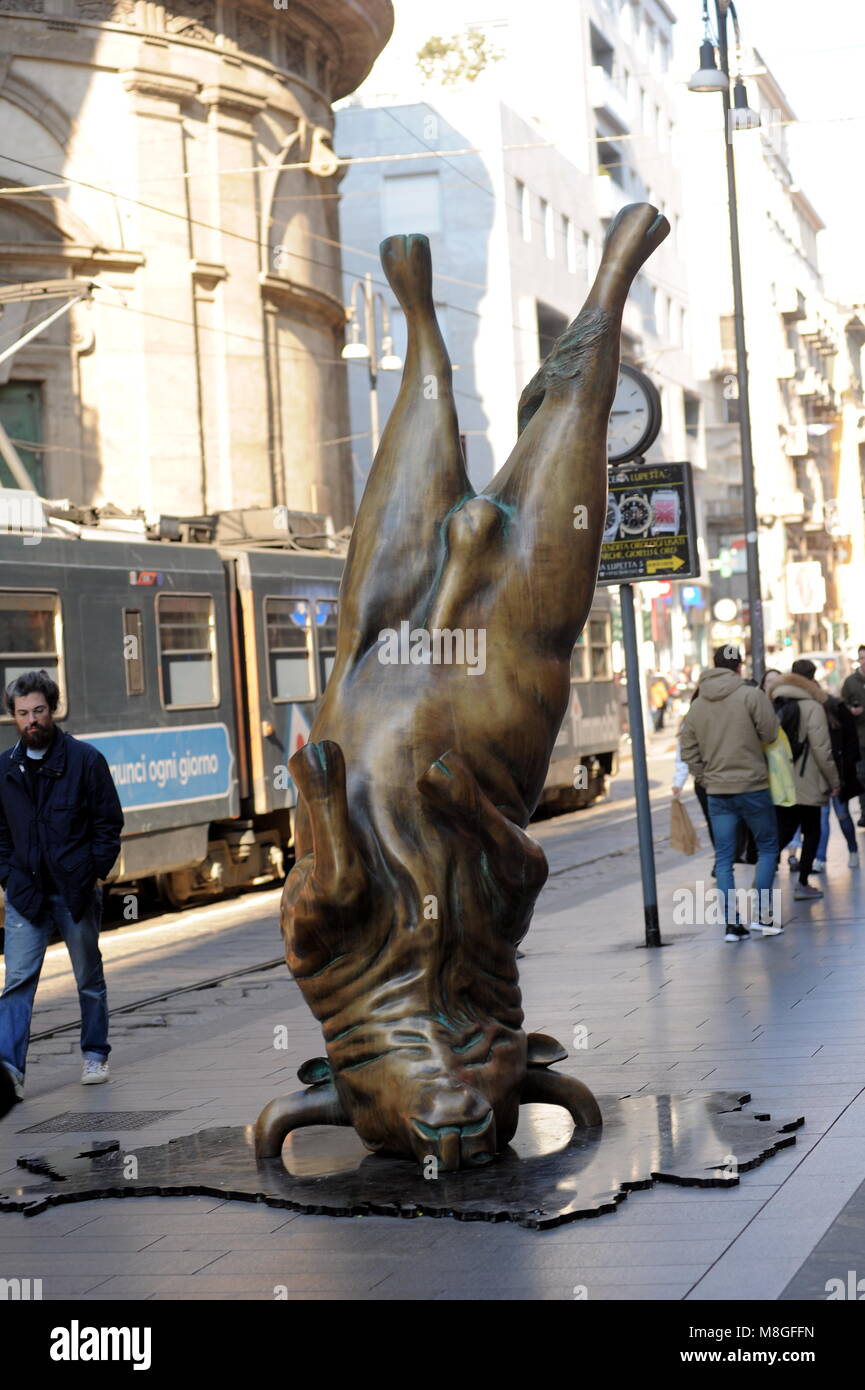 A statue of a bull upside down signed by Christian Balzano has been ...