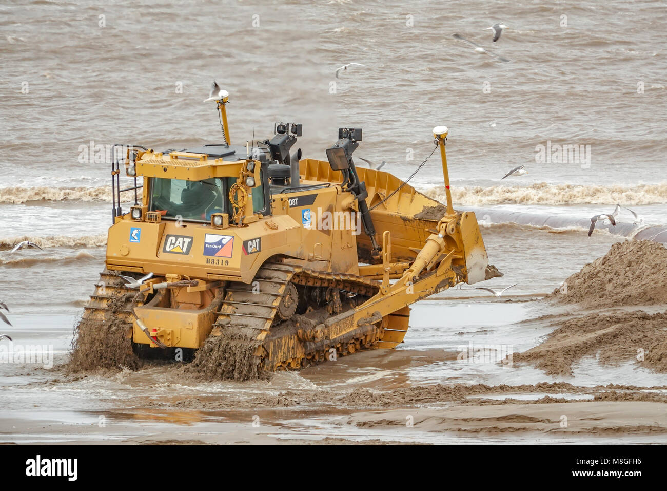Pumping sand onto the beach to replace what has been lost due to rising ...