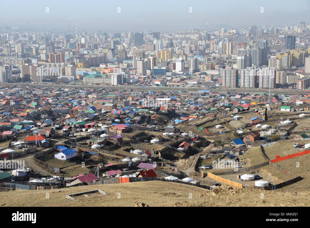 Ulaanbaatar skyline seen covered in smog. Extreme winter temperatures ...