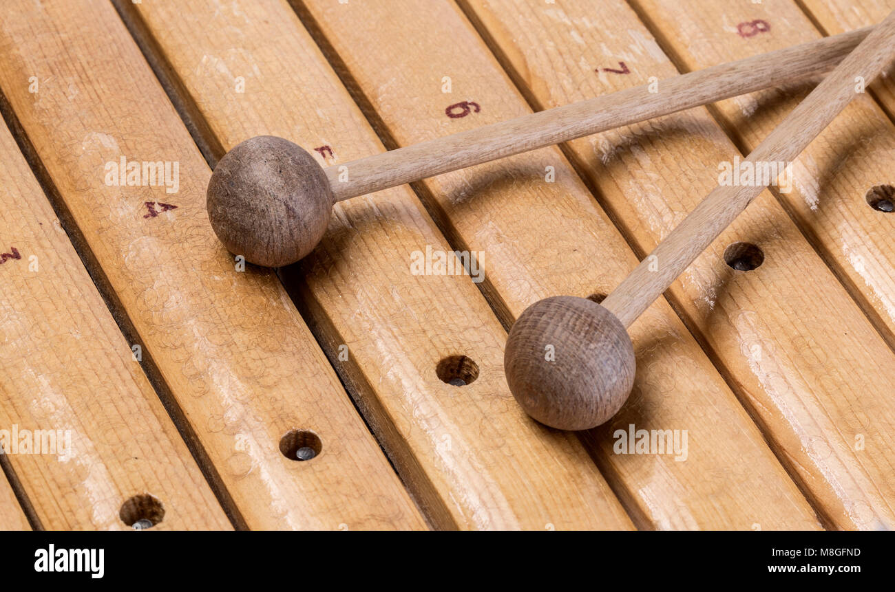 The close up xylophone and two mallets on the white background Stock ...