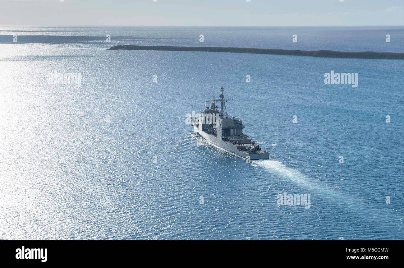 An aerial view of U.S. Naval Base Guam shows the Ticonderoga-class ...