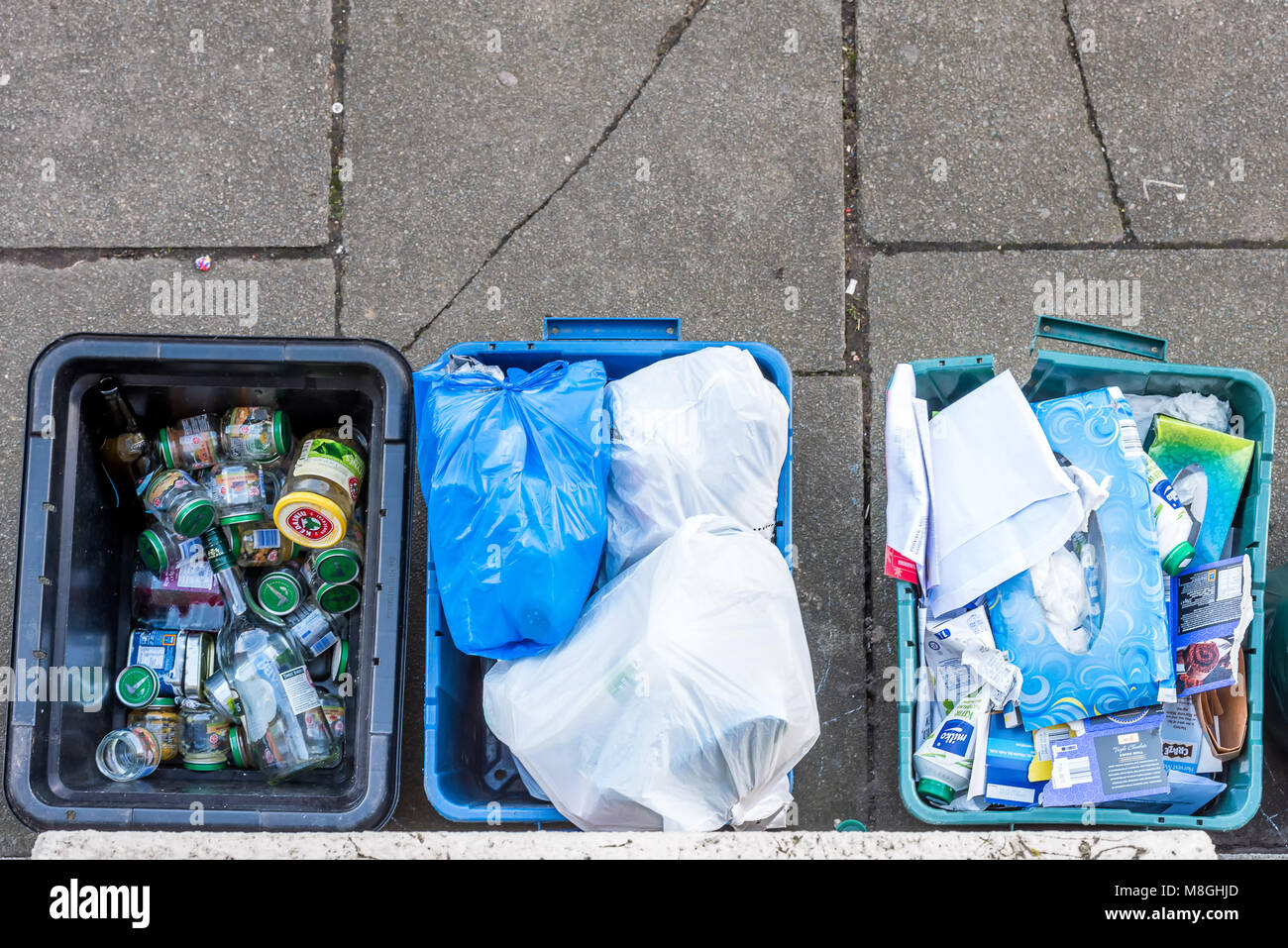 Wheely bins blue wheely bins green wheely bins recycle hi-res stock photography and images - Alamy