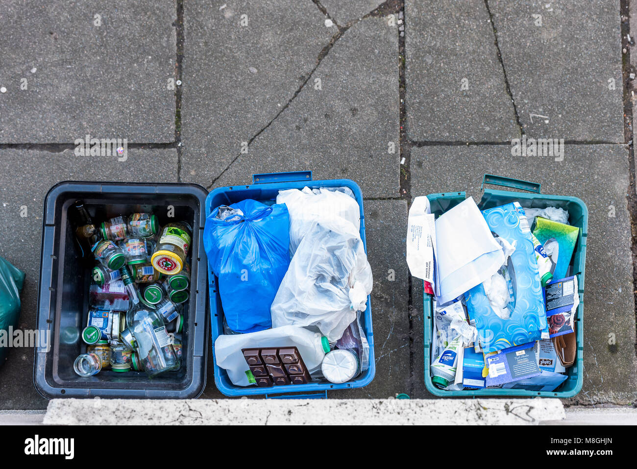 Overhead day view plastice waste refuse bins boxes on British road ...