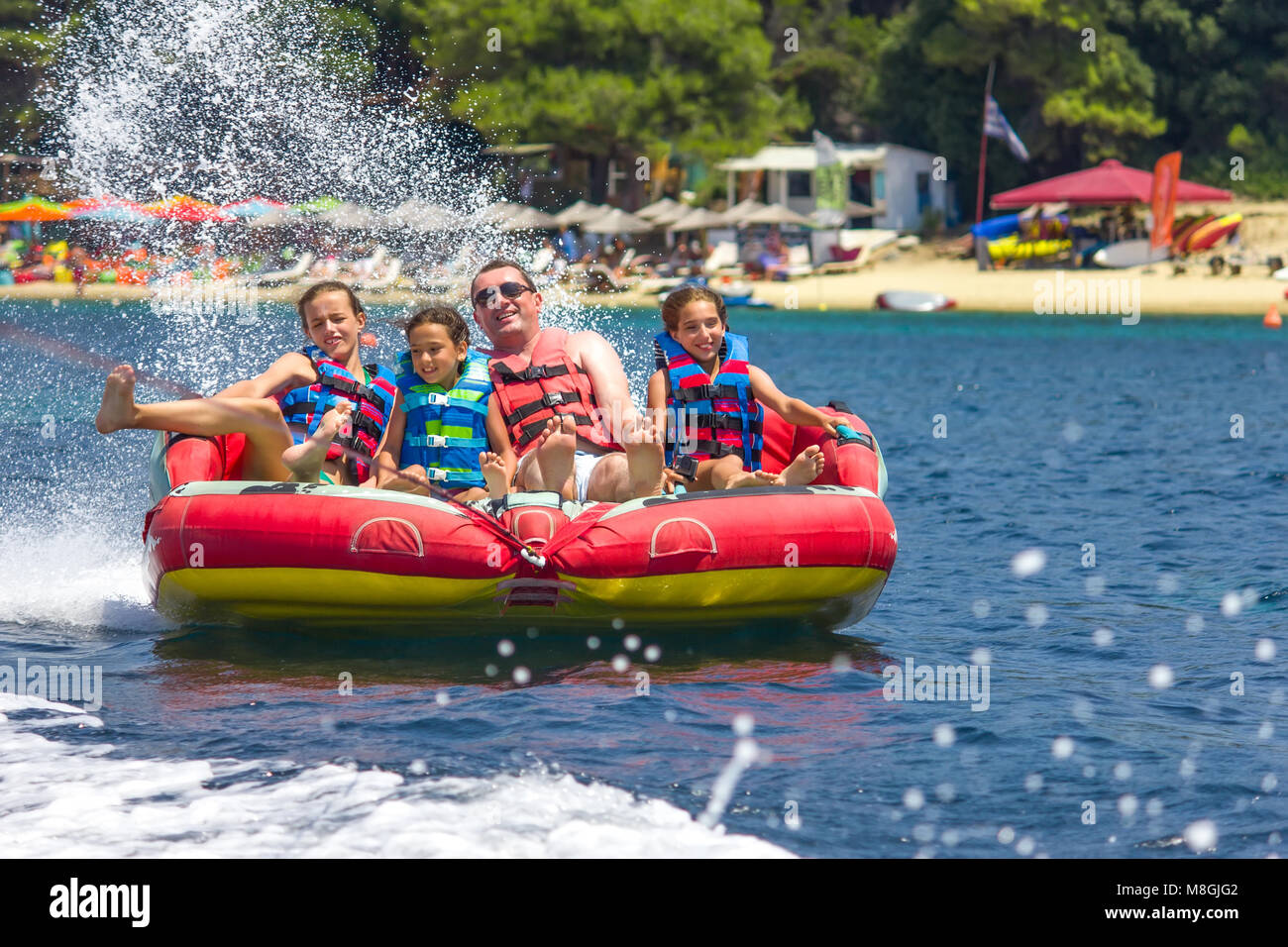 Family water sport adventure on the sea Stock Photo - Alamy