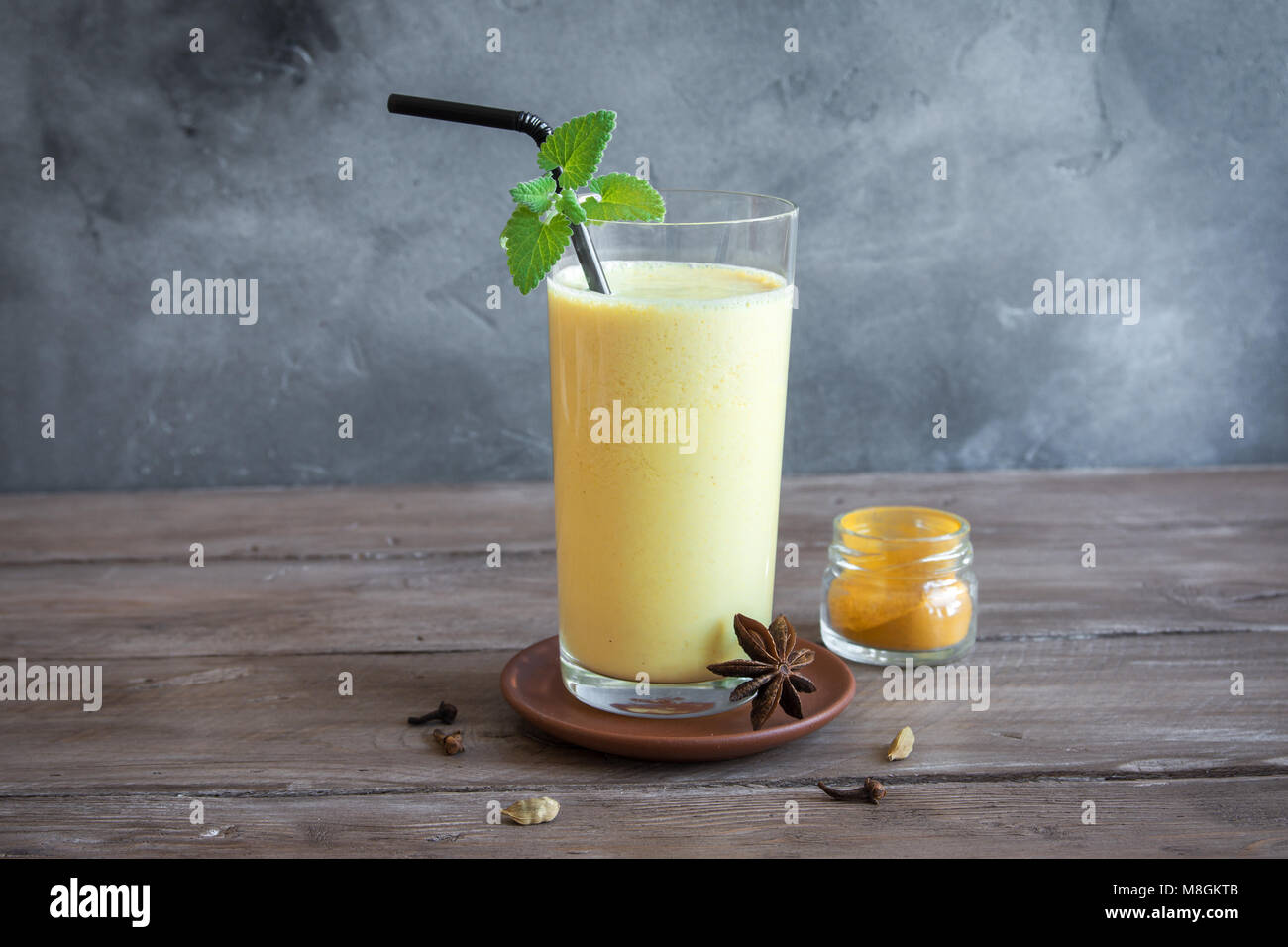 Turmeric Lassie or lassi in glass - Healthy Probiotic Indian cold drink ...