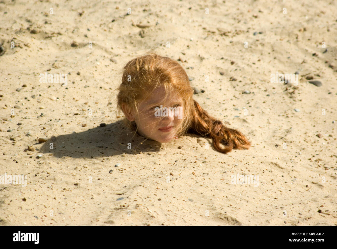 Burried on the Beach Stock Photo - Alamy