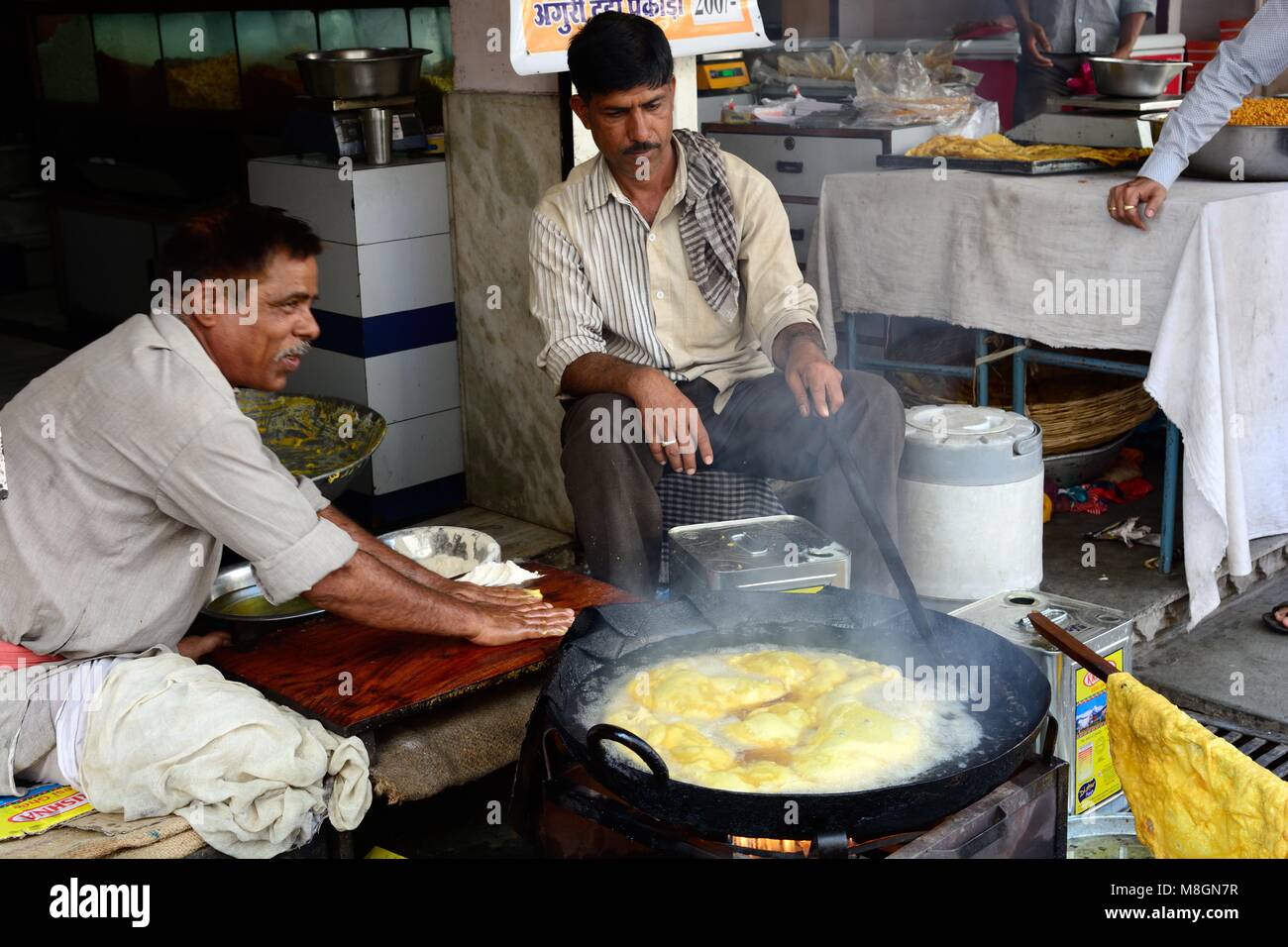 Indian street food of deep fried roti Indian bread Udaiour Rajasthan ...