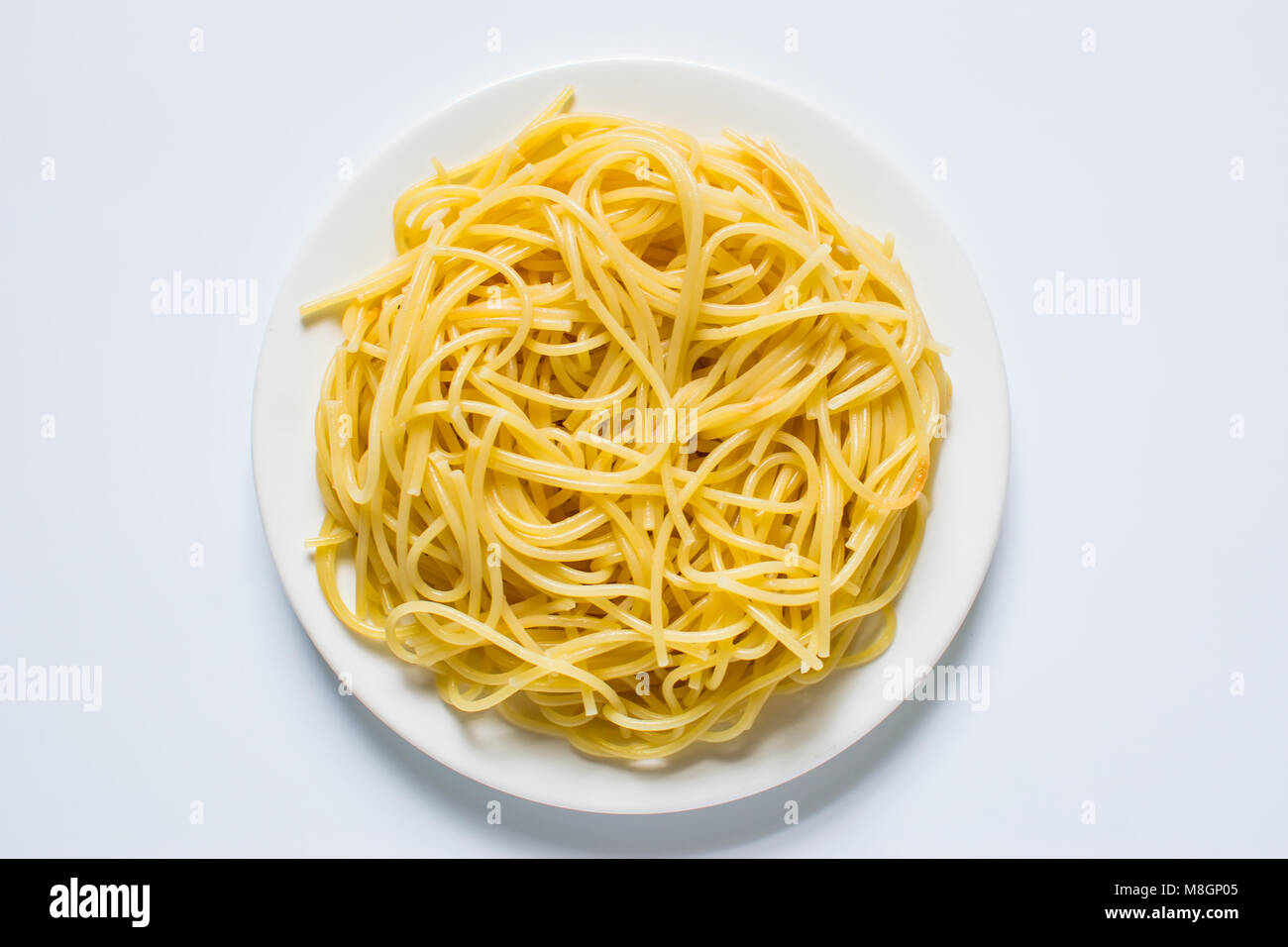 Spaghetti pasta on isolated white background Stock Photo - Alamy