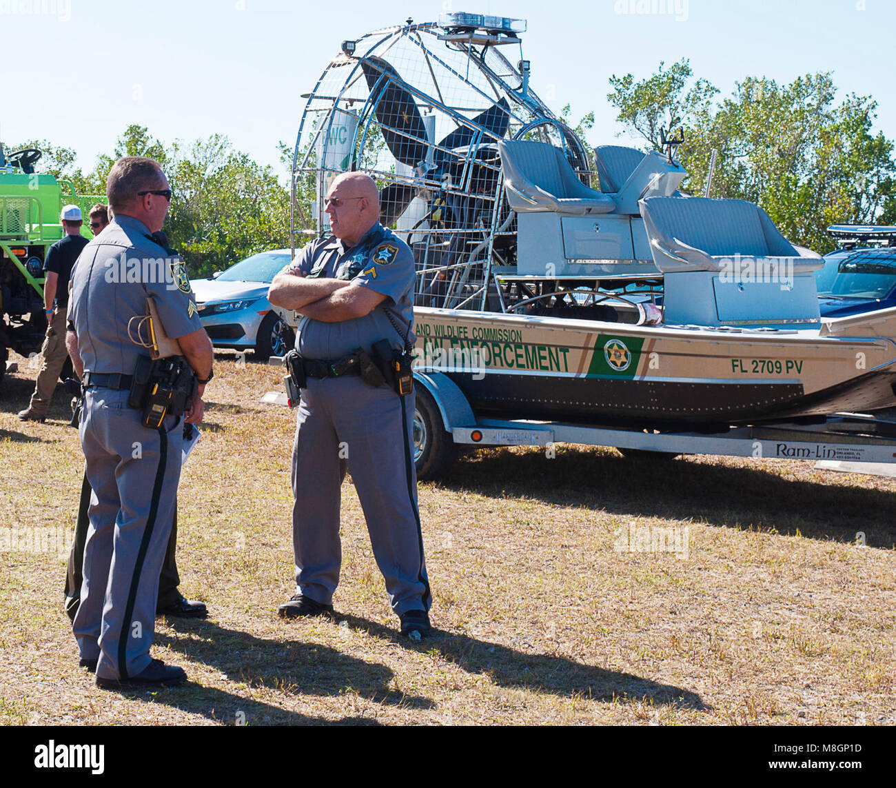 Collier County sheriffs Danny and Eddy with an FWC Law Stock Photo - Alamy