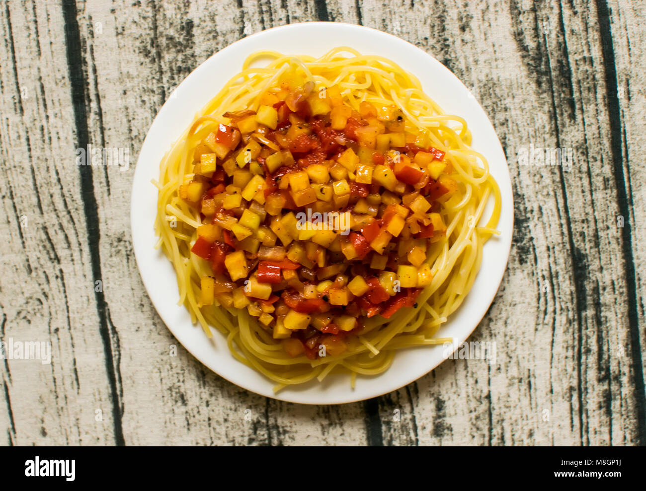 Spaghetti pasta on wood background Stock Photo - Alamy