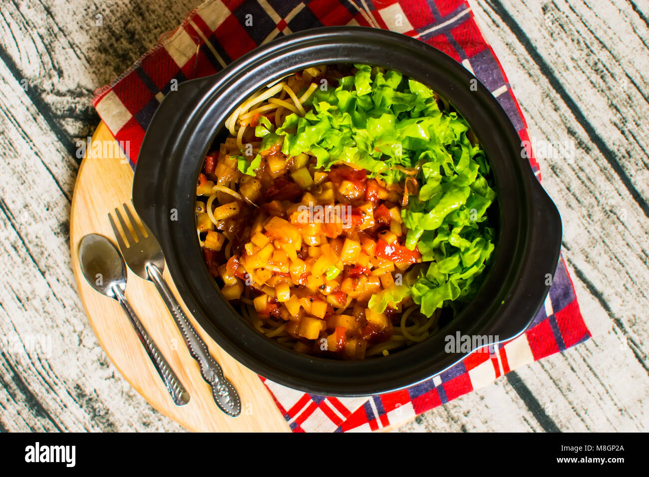 Spaghetti pasta on wood background Stock Photo - Alamy