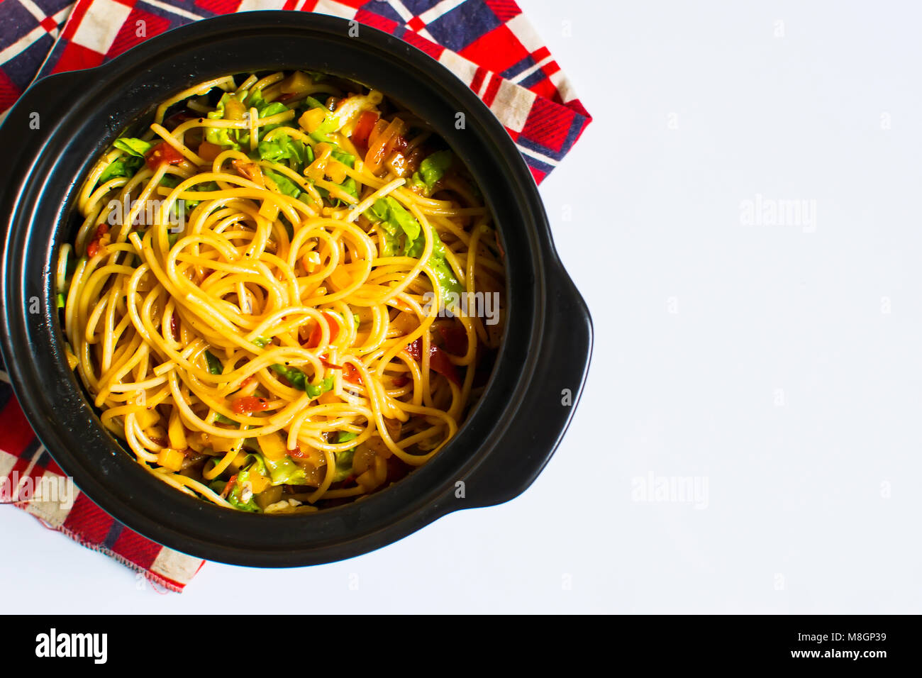 Spaghetti pasta on isolated white background Stock Photo - Alamy