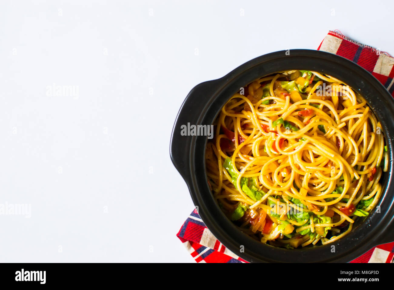 Spaghetti pasta on isolated white background Stock Photo - Alamy
