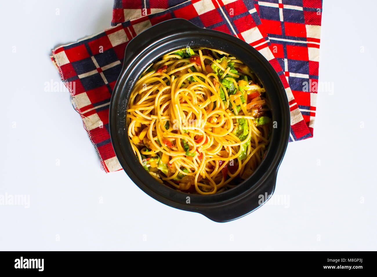 Spaghetti pasta on isolated white background Stock Photo - Alamy