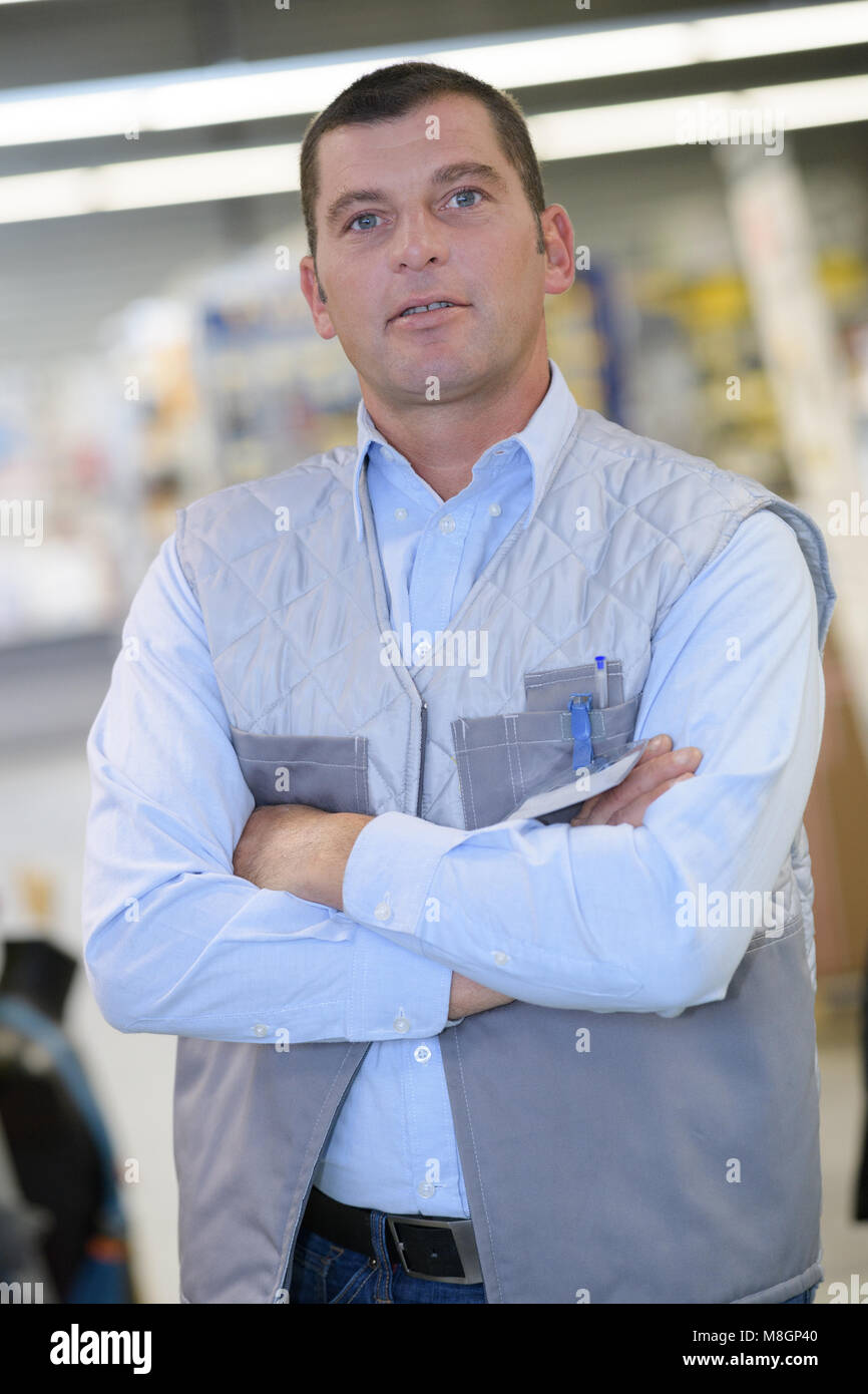 Standing man wearing sleeveless hi-res stock photography and images - Alamy