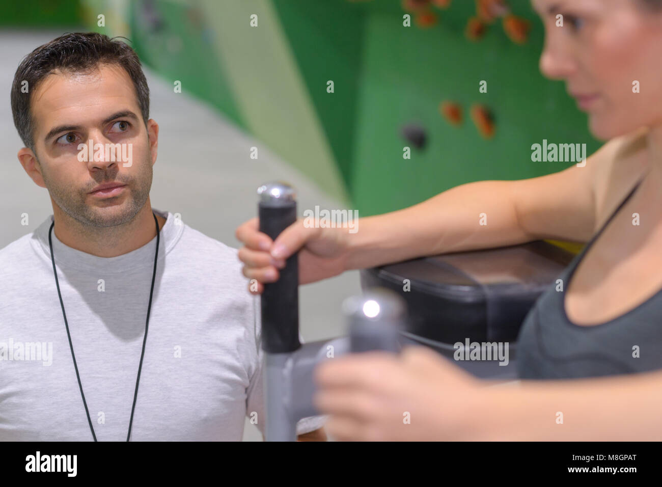 personal trainer with client Stock Photo - Alamy