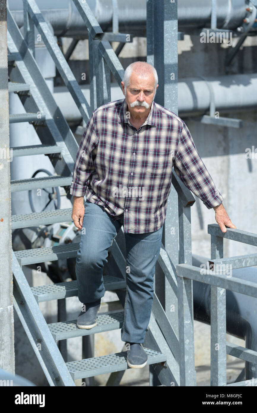 man walking down the steps Stock Photo - Alamy