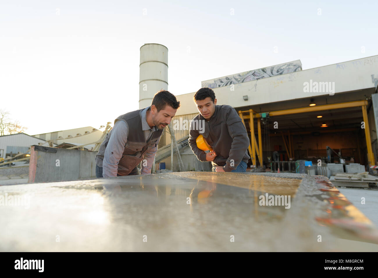 warehouse workers outside factory Stock Photo - Alamy
