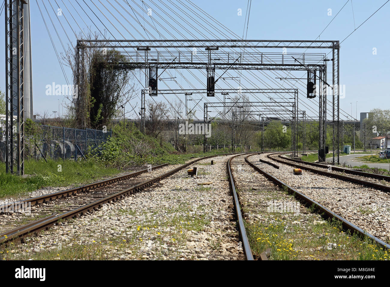 Three Rail Tracks Railway With Overhead Electrical Train Line Stock ... Three Rail Tracks Railway With Overhead Electrical Train Line Stock ...