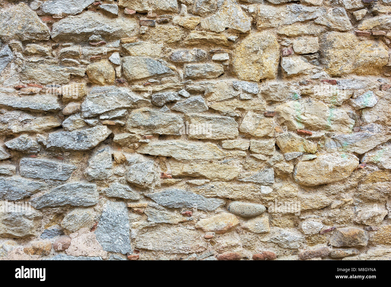 Part of the stone wall of the ancient medieval castle Stock Photo - Alamy