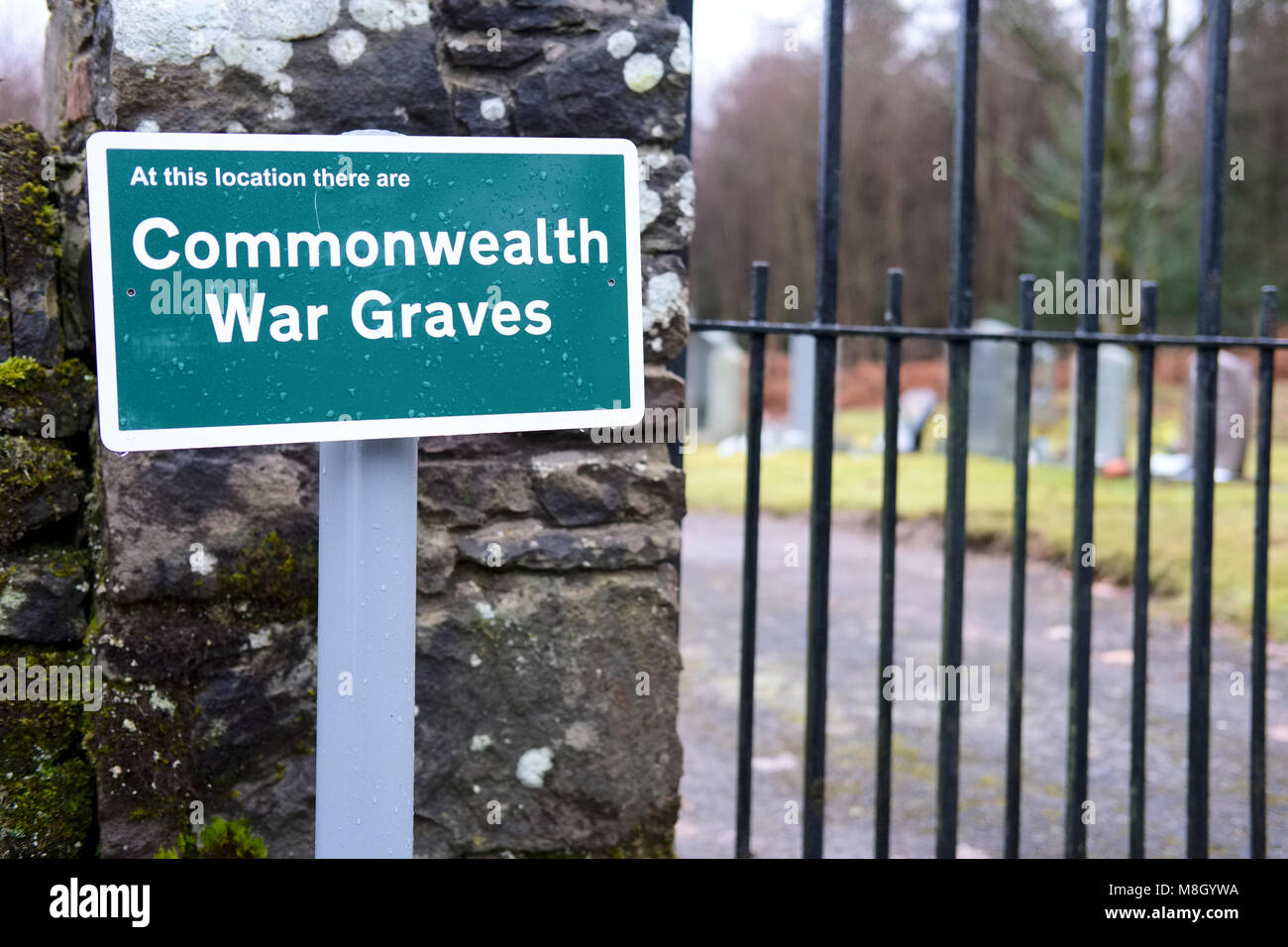 Commonwealth war graves memorial in church graveyard uk Stock Photo - Alamy