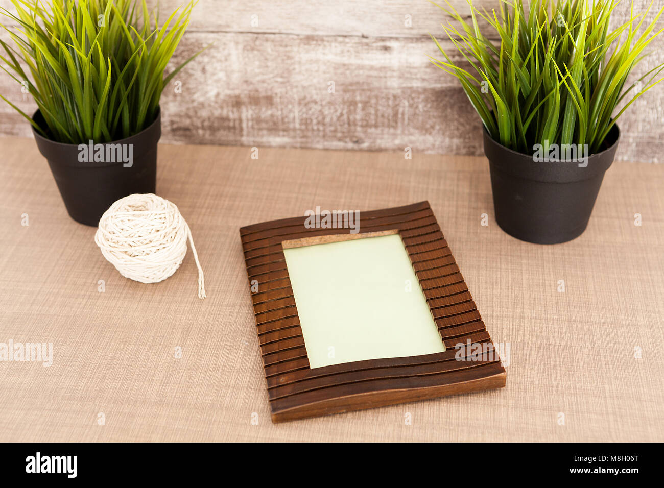 Beautiful photo frame lying on table Stock Photo - Alamy
