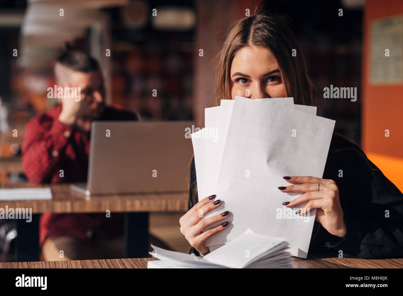Person hiding in office hi-res stock photography and images - Alamy