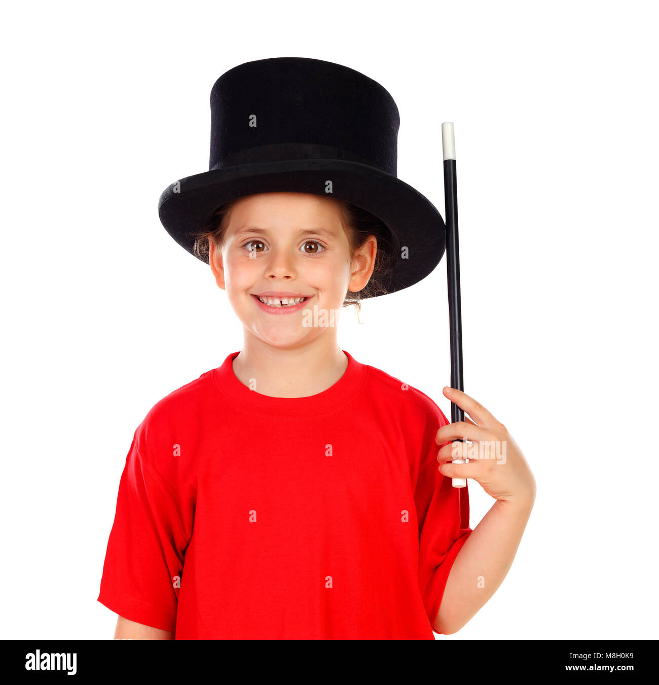 Pretty little girl doing magic with a top hat and a magic wand isolated ...